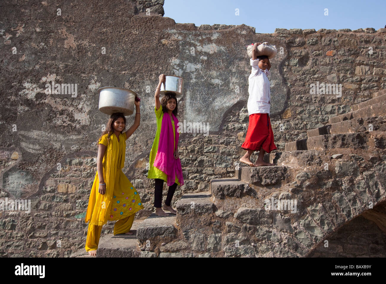 Girls Carrying Loads on their Heads in the Royal Enclosure in Mandu ...