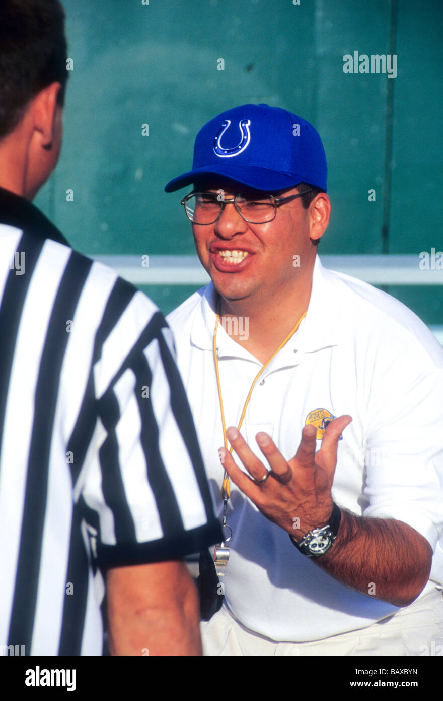 Angry man coach father official ref disagree argue emotion mad Hispanic ...