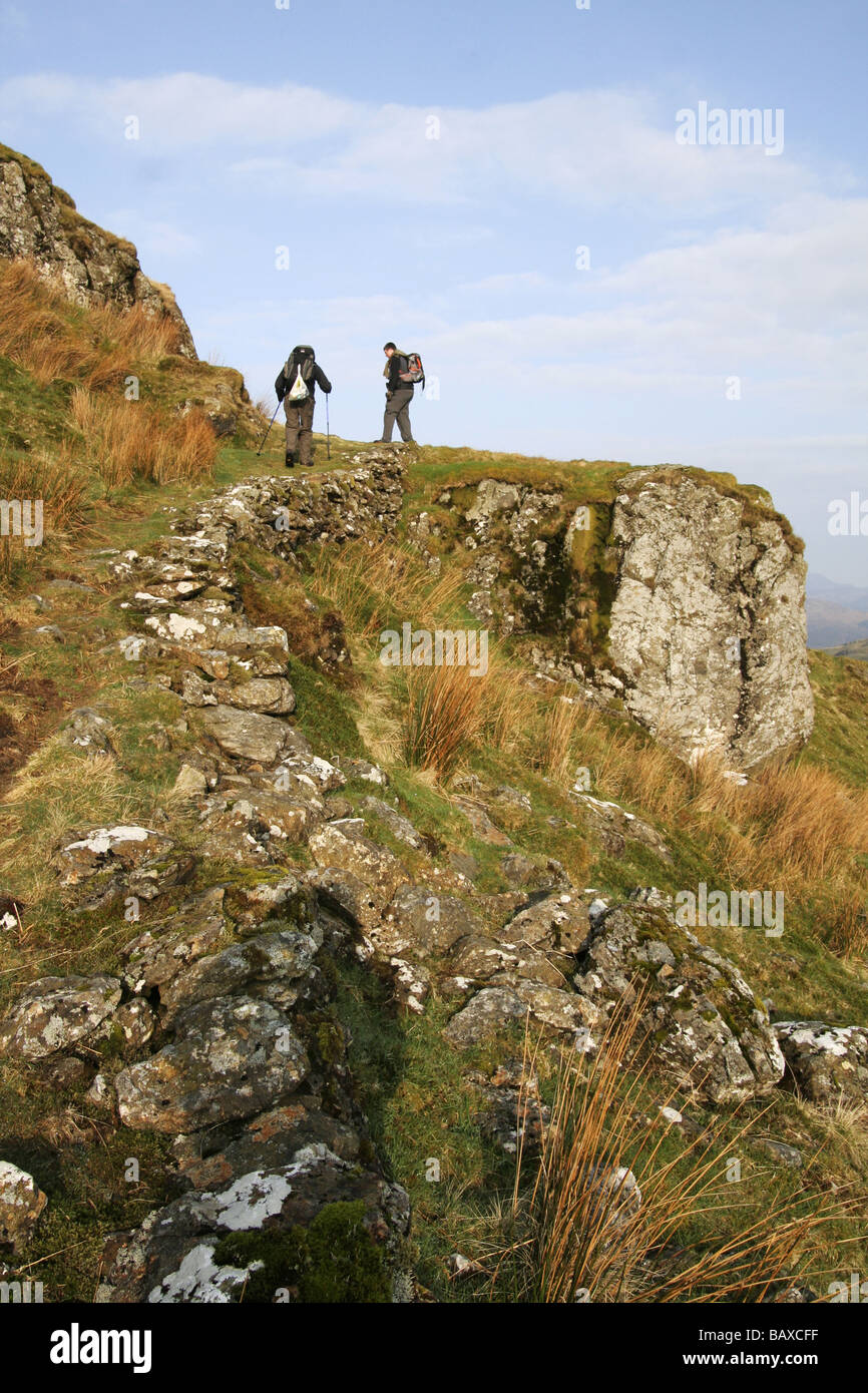 Walk in the country wilderness trail climbing the mountains, rocky ...