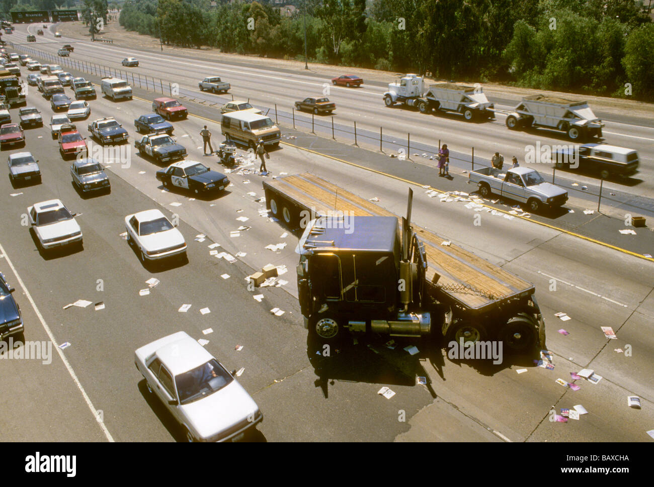 freeway highway accident truck jacknife crash spill traffic block ...