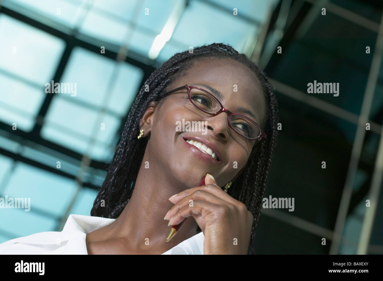 African businesswoman wearing eyeglasses Stock Photo - Alamy