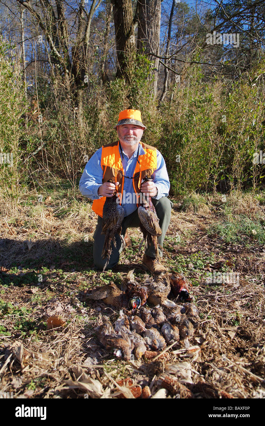 HUNTER POSING WITH DAYS HARVEST PHEASANT AND QUAIL GEORGIA Stock Photo ...