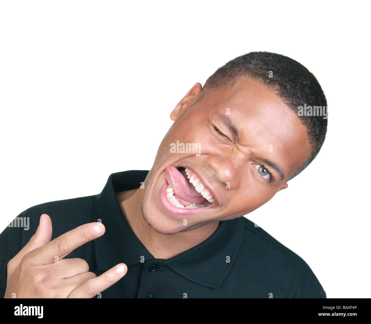 A young African American goofing off and making funny faces Stock Photo ...