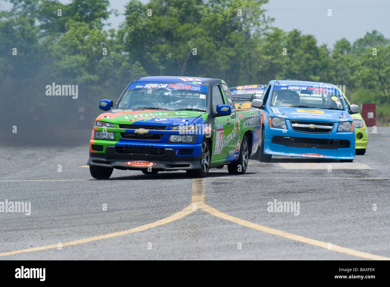 Chevrolet pickup trucks racing on a racetrack in Thailand Stock Photo ...
