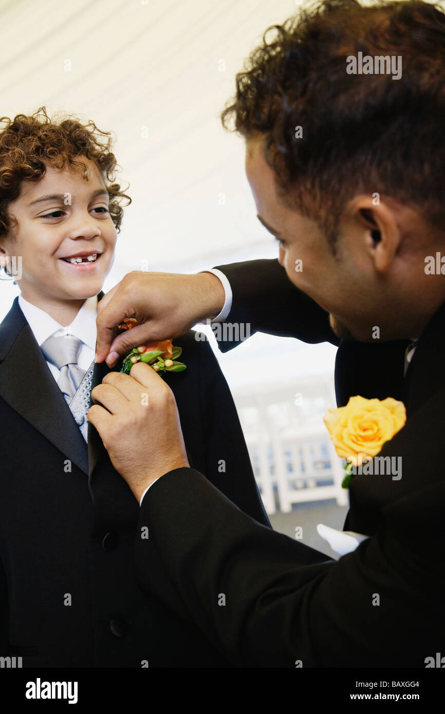 Pinning boutonniere hi-res stock photography and images - Alamy