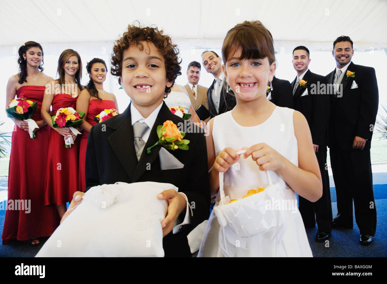 Hispanic boy and girl as ring bearer and flower girl Stock Photo - Alamy