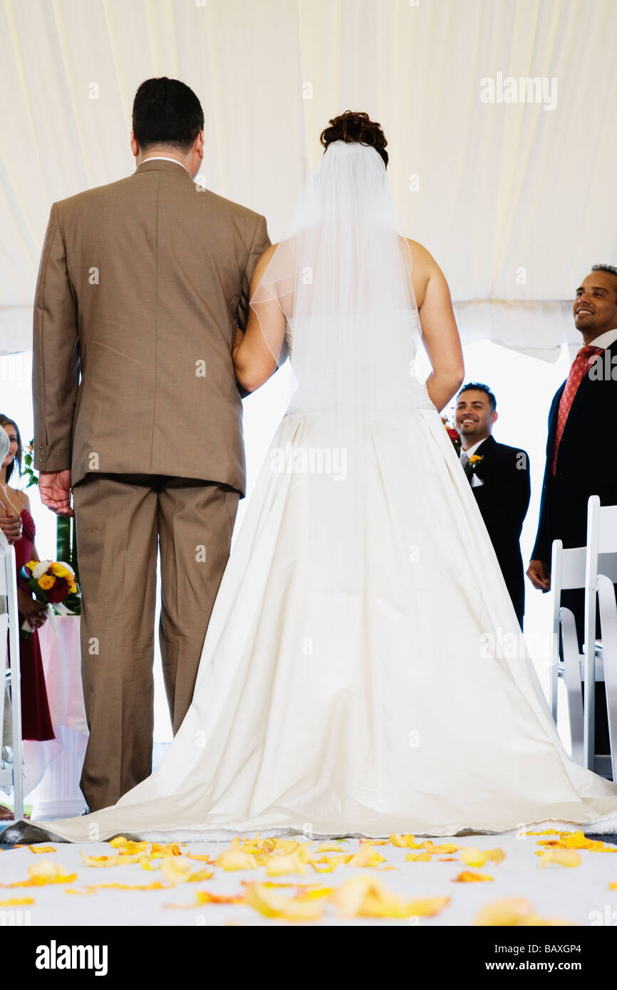 Bride groom walking down aisle hi-res stock photography and images - Alamy