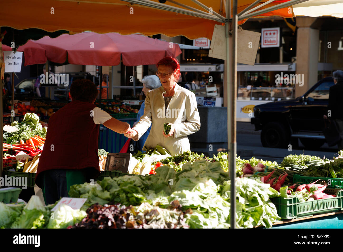 People buying fruit and vegetables at market stall hi-res stock ...