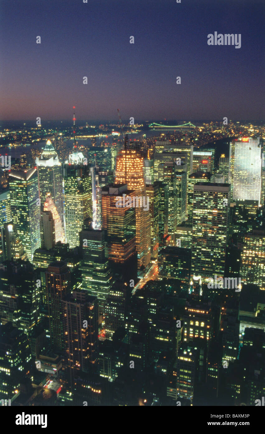 View from roof top over Manhattan at night, New York, USA, America ...