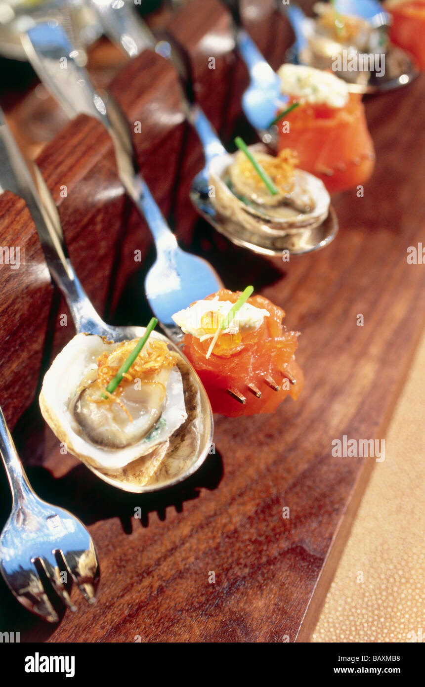 Fancy foods on spoon in Restaurant Grayz, Manhattan, New York, USA ...