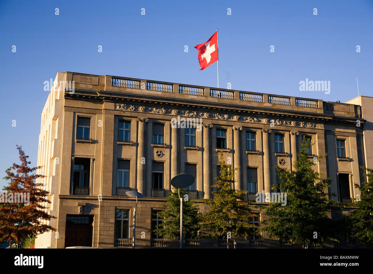Berlin swiss embassy, flag Stock Photo - Alamy