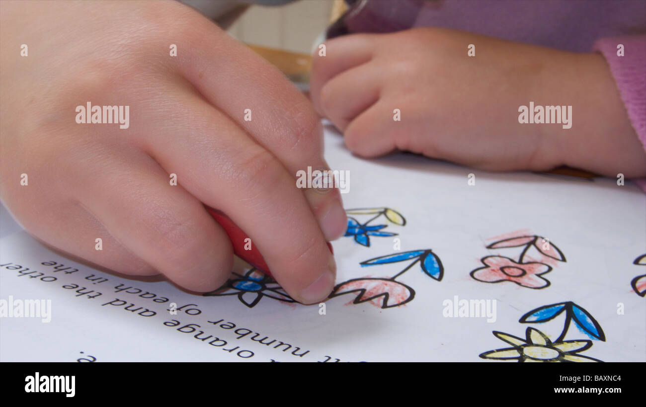 Girl drawing colouring doing homework hi-res stock photography and ...
