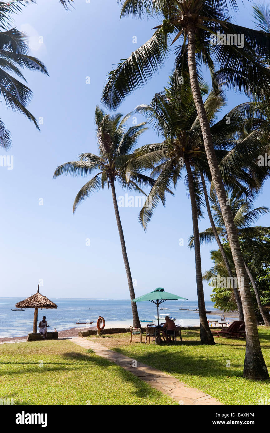 People relaxing at beach of the Sarova Whitesands Beach Resort ans Spa ...