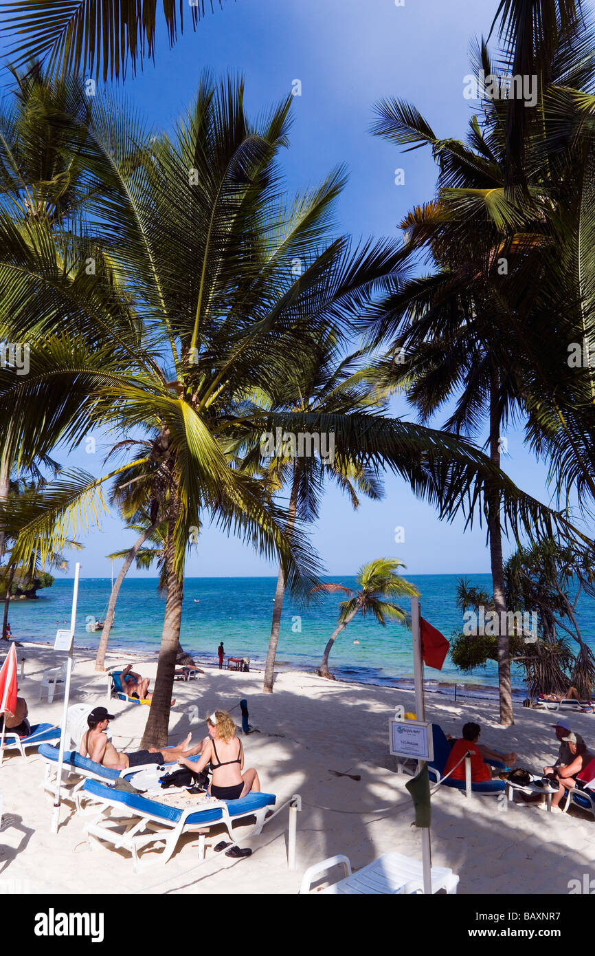 Tourists relaxing at Shanzu Beach, Dolphin Hotel, Coast, Kenya Stock ...