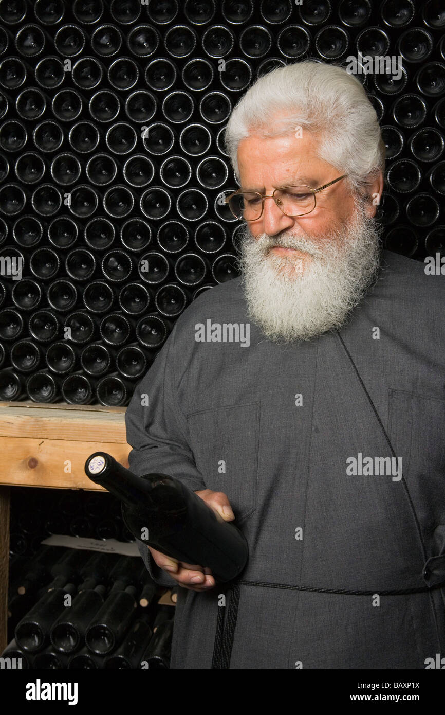 Father Dionysos in a wine cellar, winery, Chrysorrogiatissa monastery ...