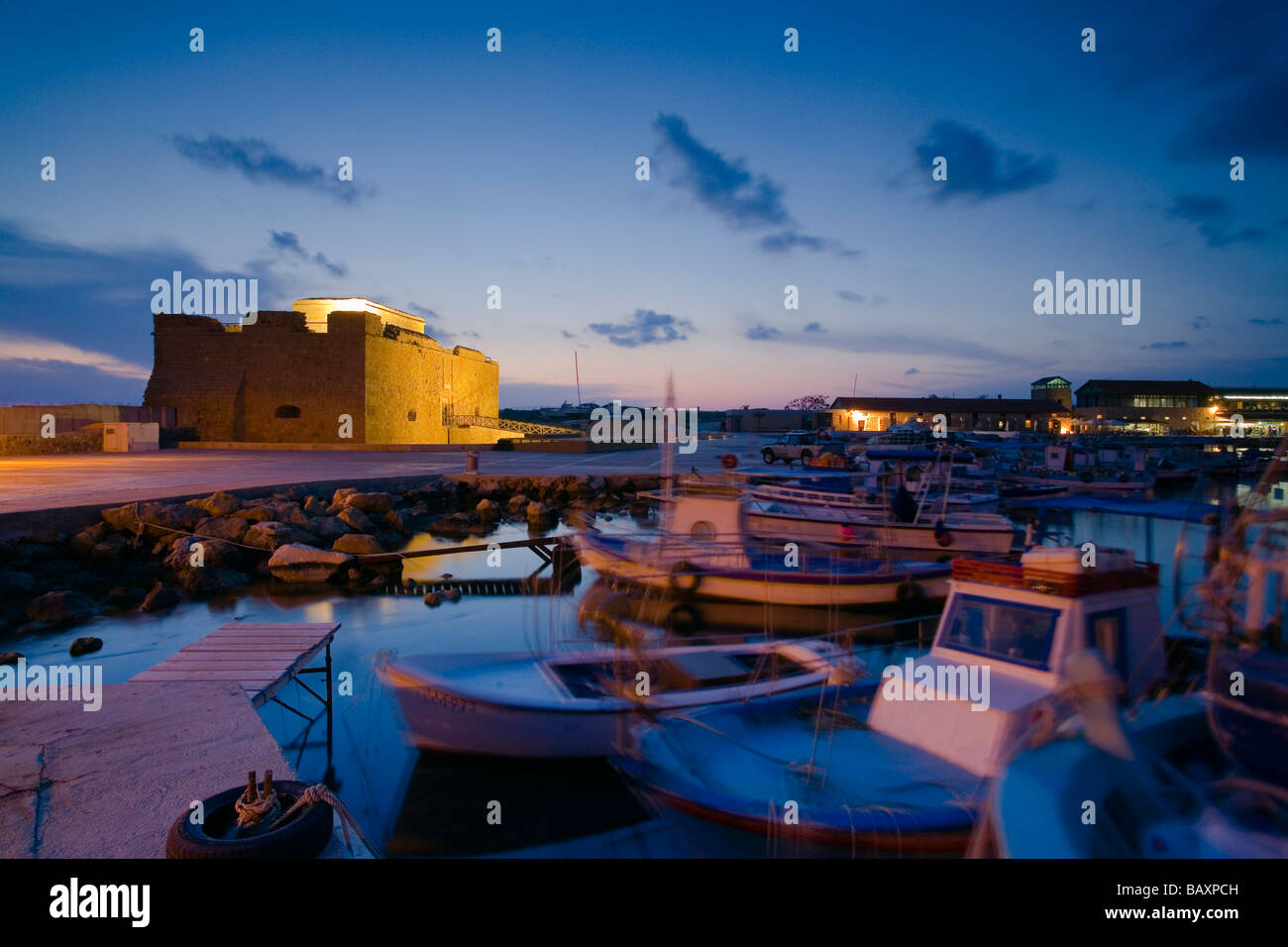 Paphos Castle at night with fishing boats, Paphos harbour, Paphos ...