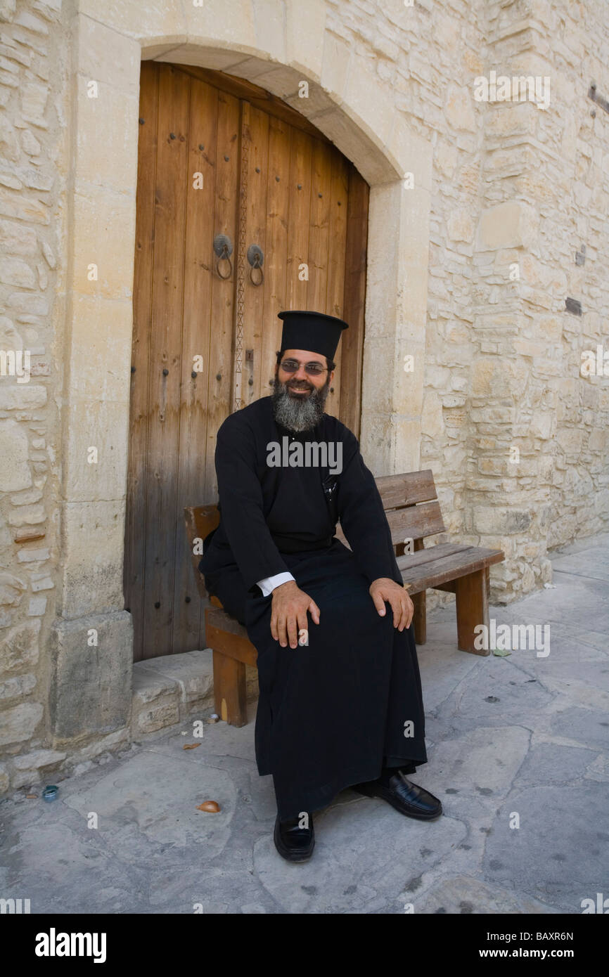 Father Neofytos an Orthodox priest, in front of a monastery, Omodos ...