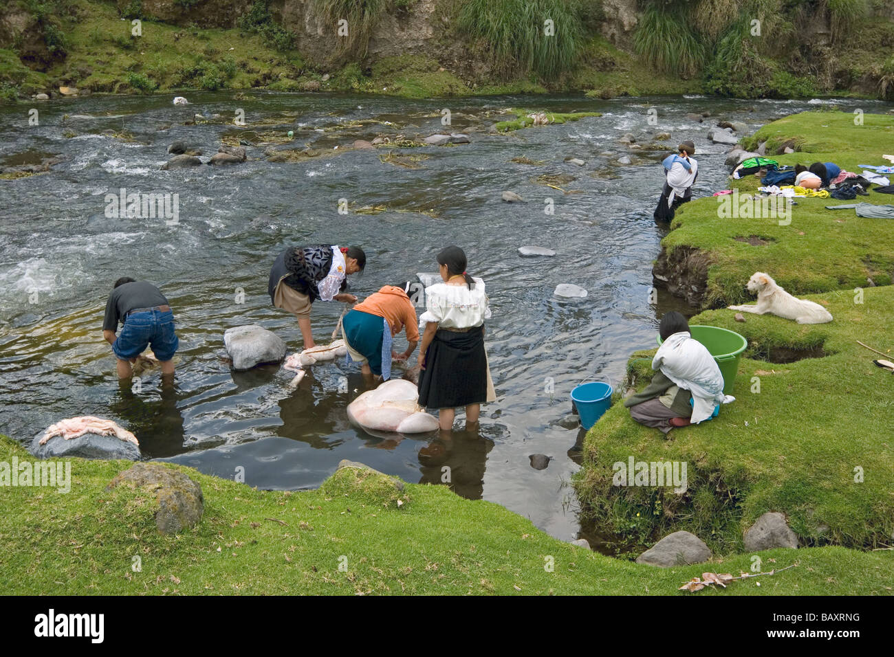Indigenous people cleaning cows intestines near the famous market town ...