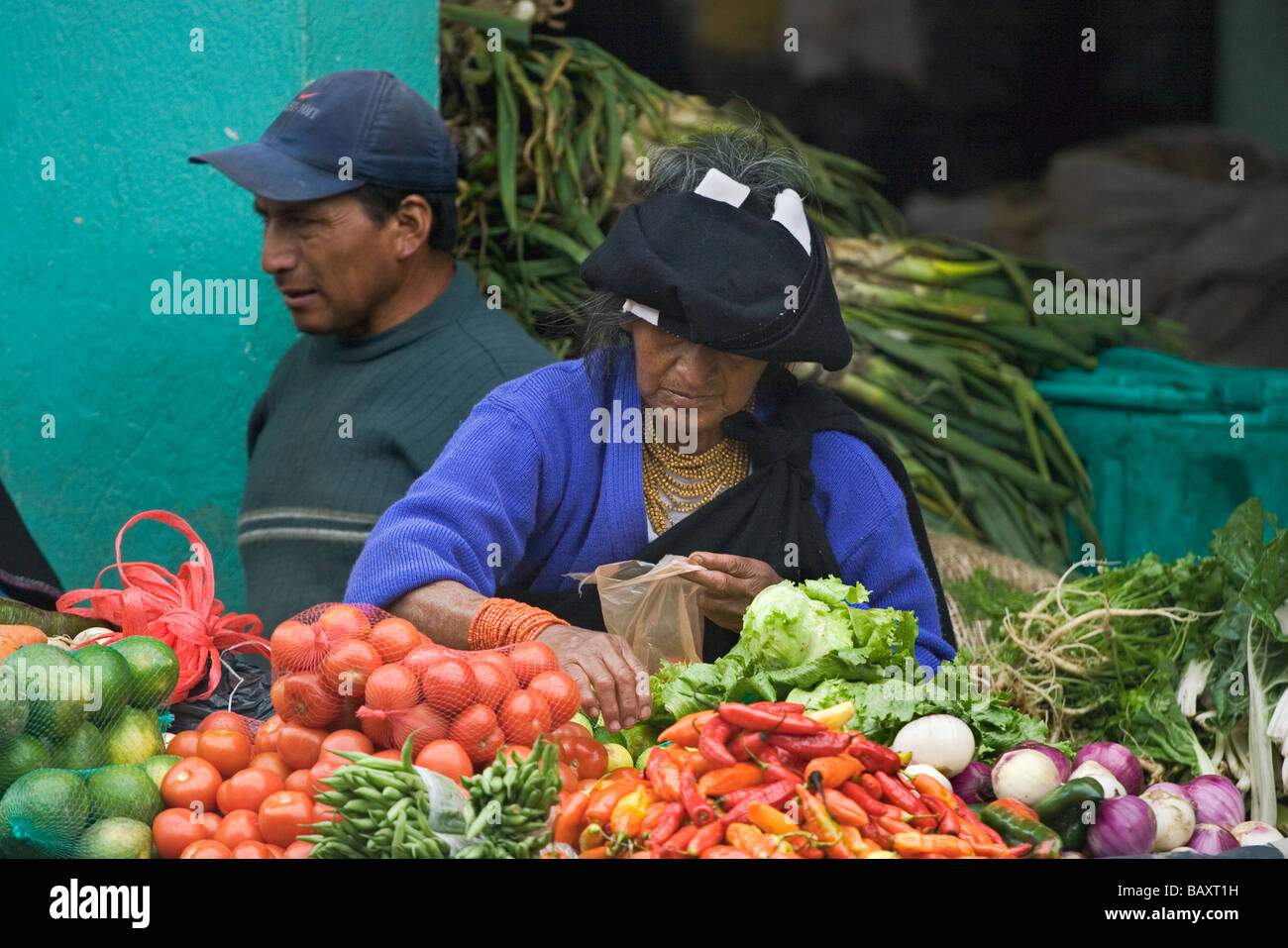 Indigenous couple selling at a vegetable stall at the famous market in ...