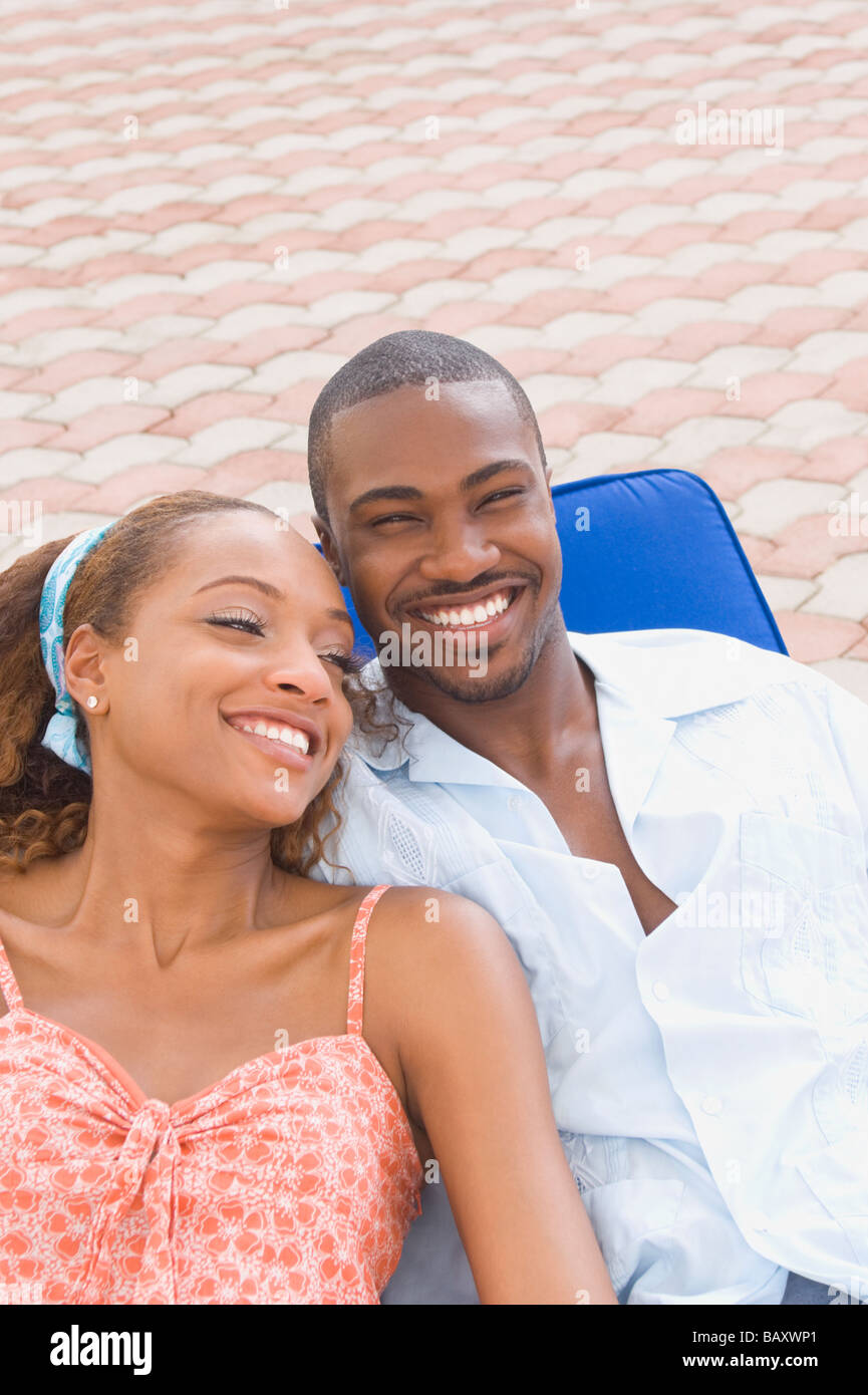 Man laying on lounge chair hi-res stock photography and images - Alamy