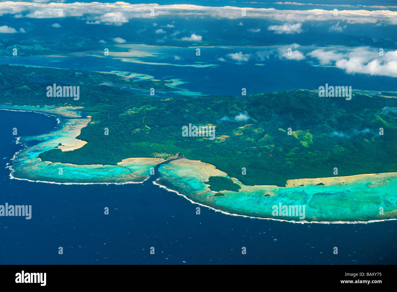 Aerial view of surf breaking on the windward side of the coral fringing ...