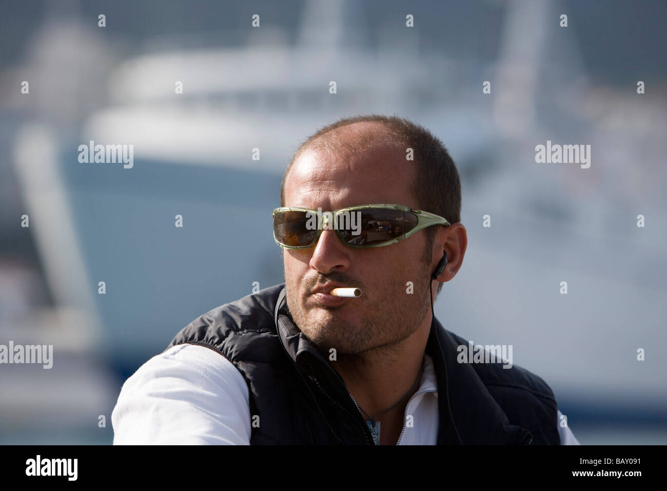 Cool Italian boat driver with sunglasses and cigarette, Capri, Campania ...