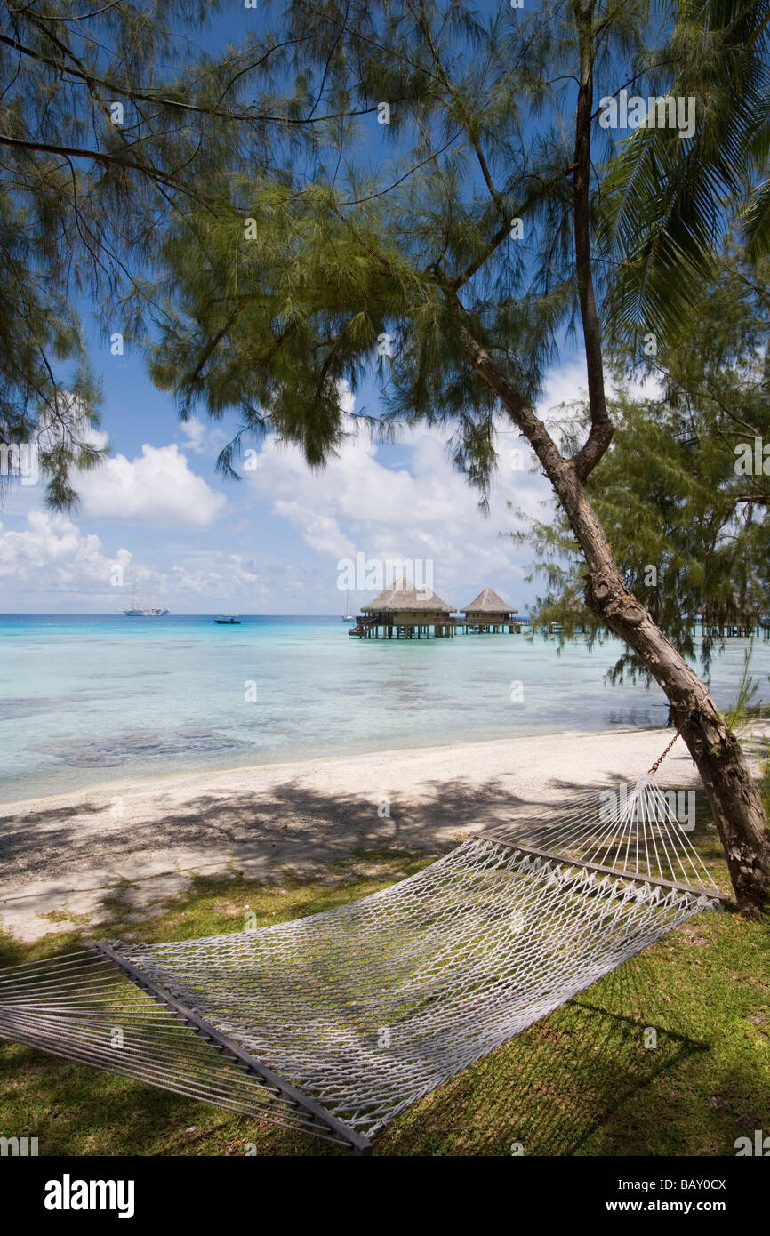 Hammock and Hotel Kia Ora overwater bungalows, Avatoru, Rangiroa, The ...