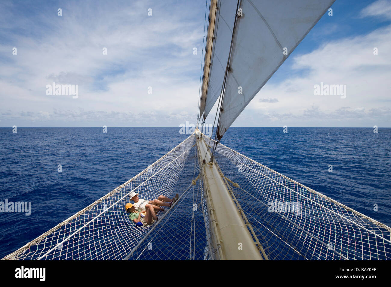Couple relaxing in bowsprit net of sailing Cruiseship Star Flyer (Star ...