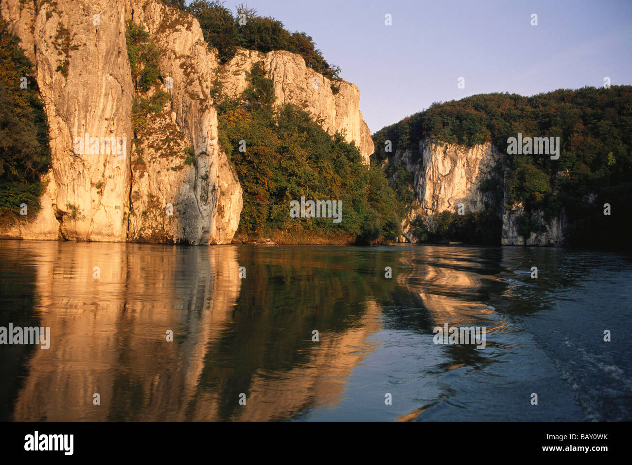 Canyon of the river Danube reflecting sunlit limestone cliffs ...