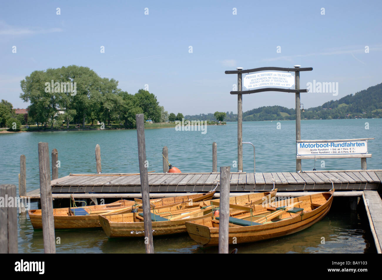 A jetty with rowing boats at a lake, Bad Wiessee, Bavaria, Germany ...