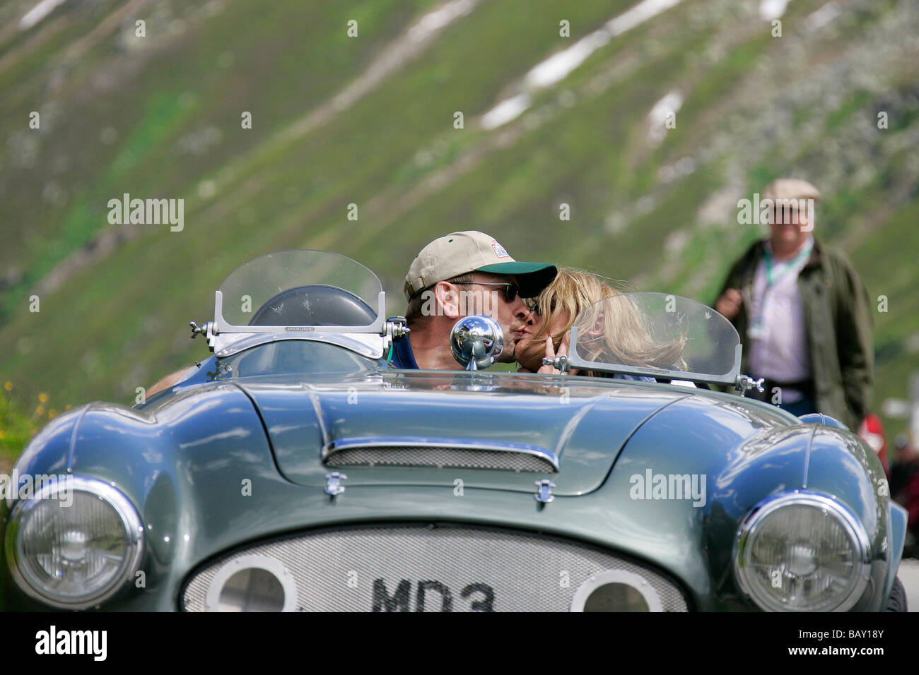 Couple kissing in 1966 Austin Healey 100, 6 Silverstone, Silvretta ...