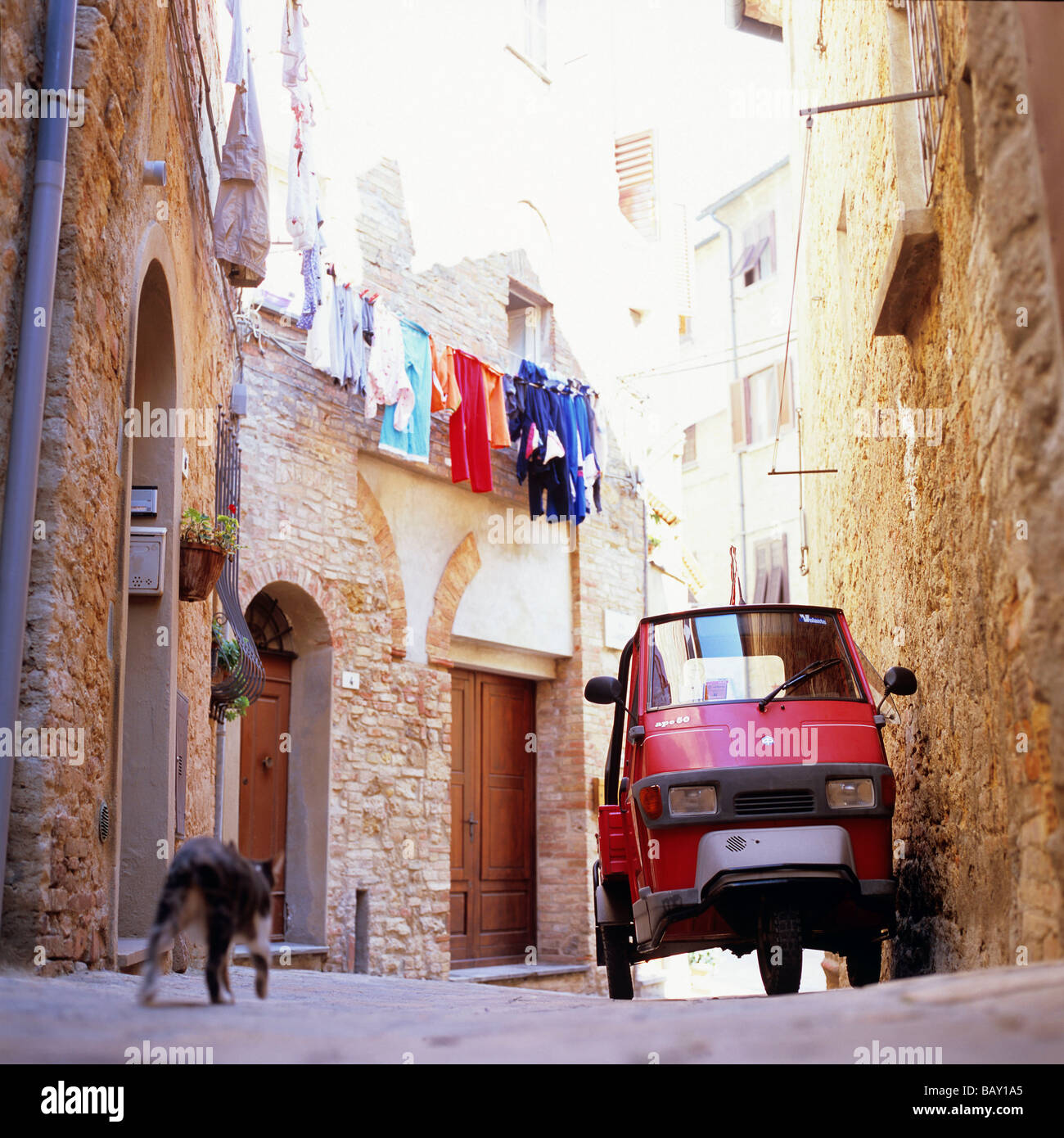 Small car standing in a narrow alley, Montepulciano, Tuscany, Italy ...
