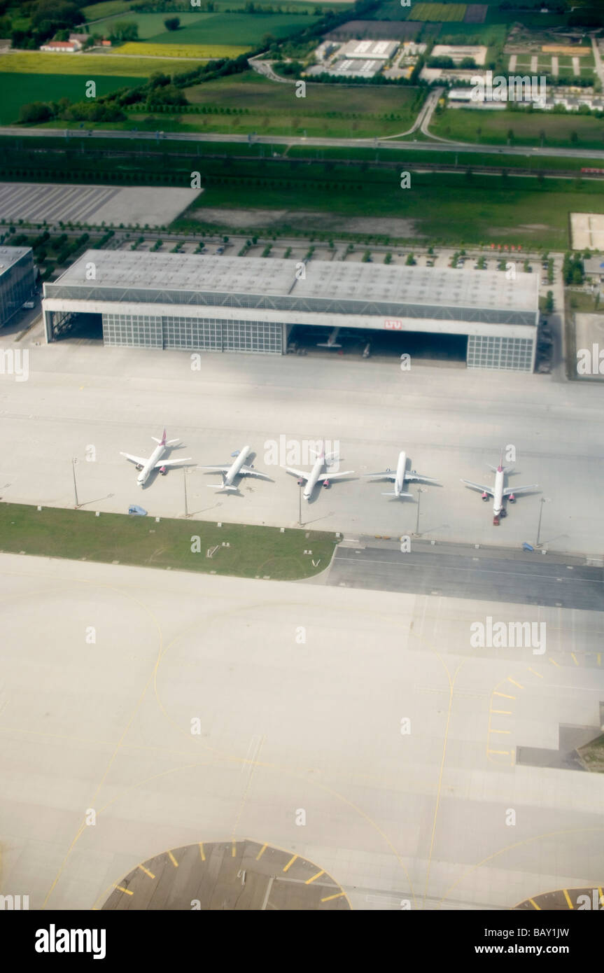 Five airplanes parking in a row at the airport, Munich, Bavaria ...