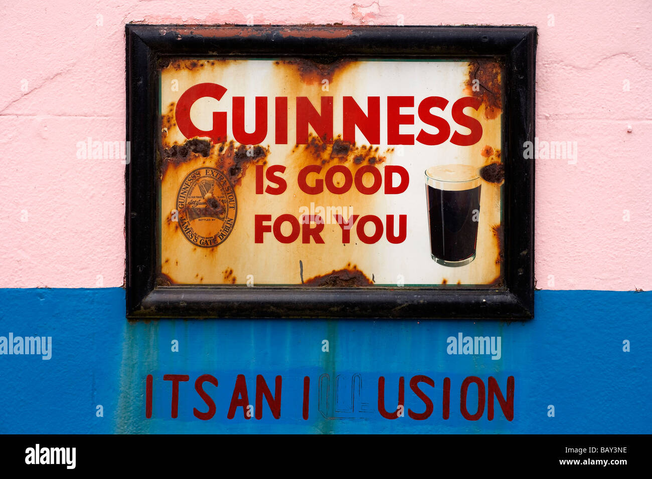 Old advertising sign for beer outside Dan Foley`s Pub in Annascaul ...