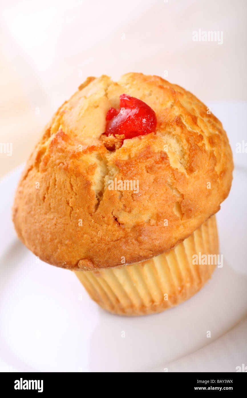 freshly baked cherry muffin ready to eat Stock Photo - Alamy