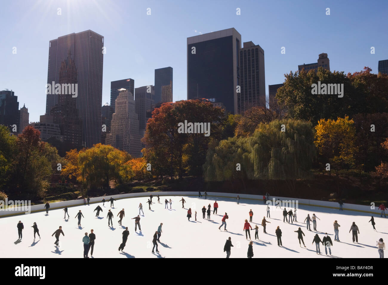 Crowd of people ice skating in urban skating rink Stock Photo - Alamy