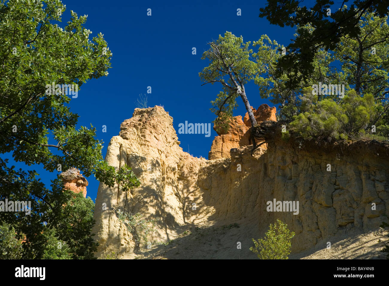 Colorado Provencal, rocks of ochre under a blue sky, Rustrel, Vaucluse ...