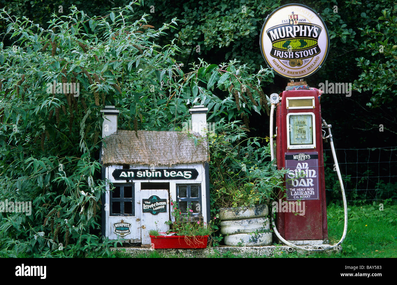 Old gas station, petrol station with Murphys beer sign on top near a ...