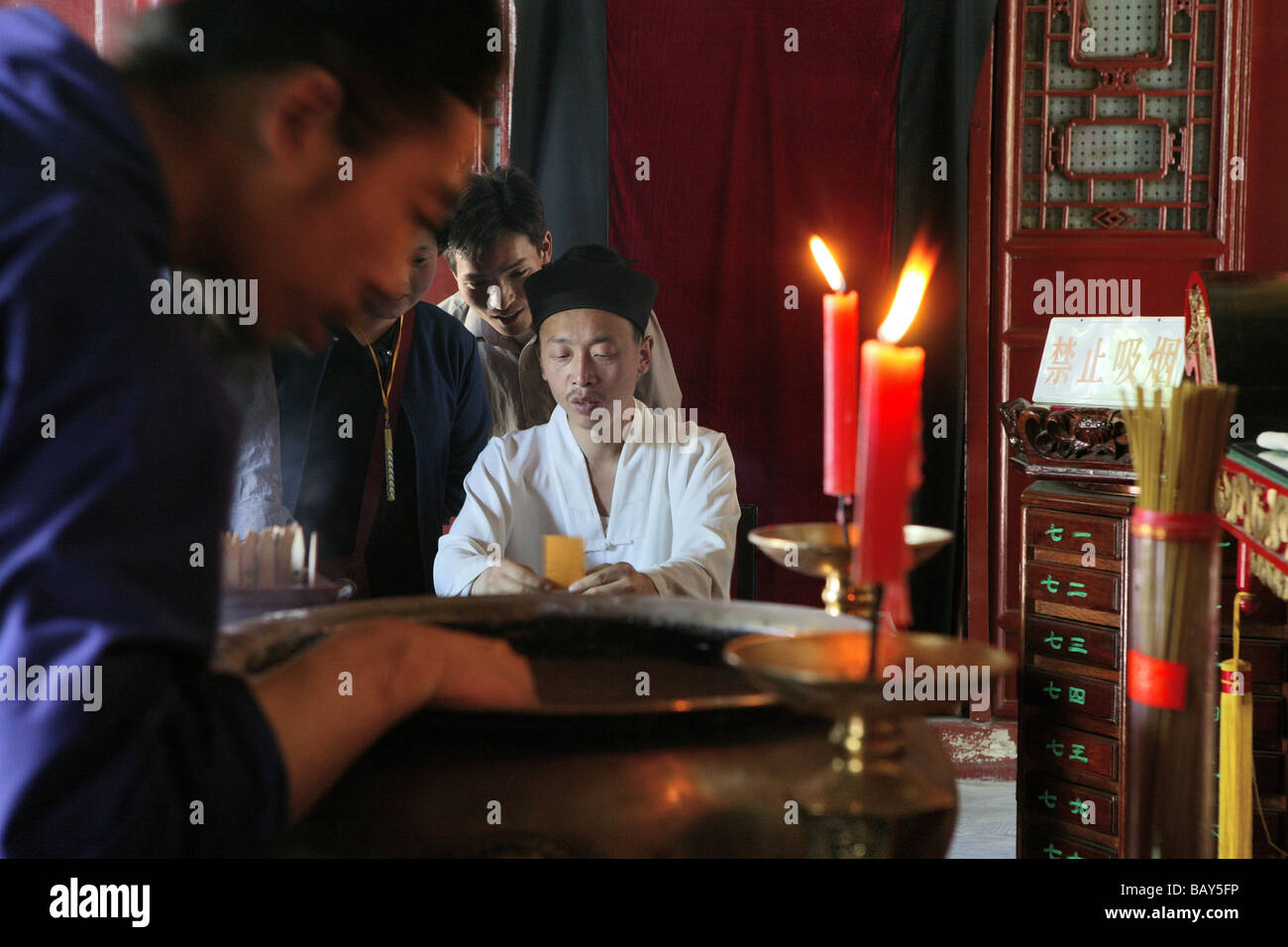 Prophesier, a monk at the altar of a taoist temple, Hua Shan, Shaanxi ...
