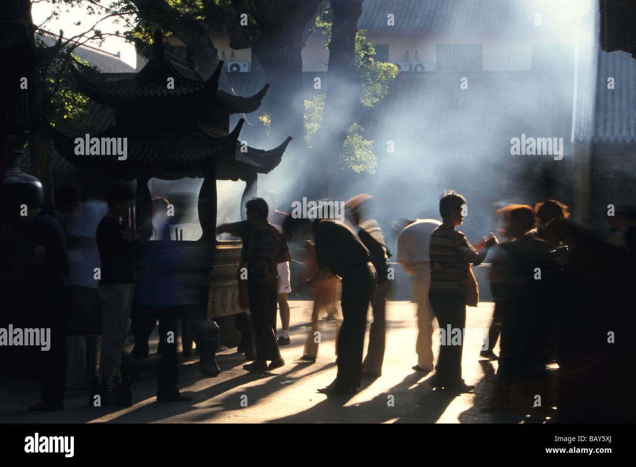 Pilgrims and tourists praying at Puji Si Temple, Buddhist Island of ...