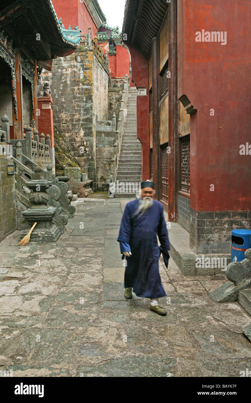 Elderly taoist monk in an alleyway in the village Wudang Shan, Taoist ...