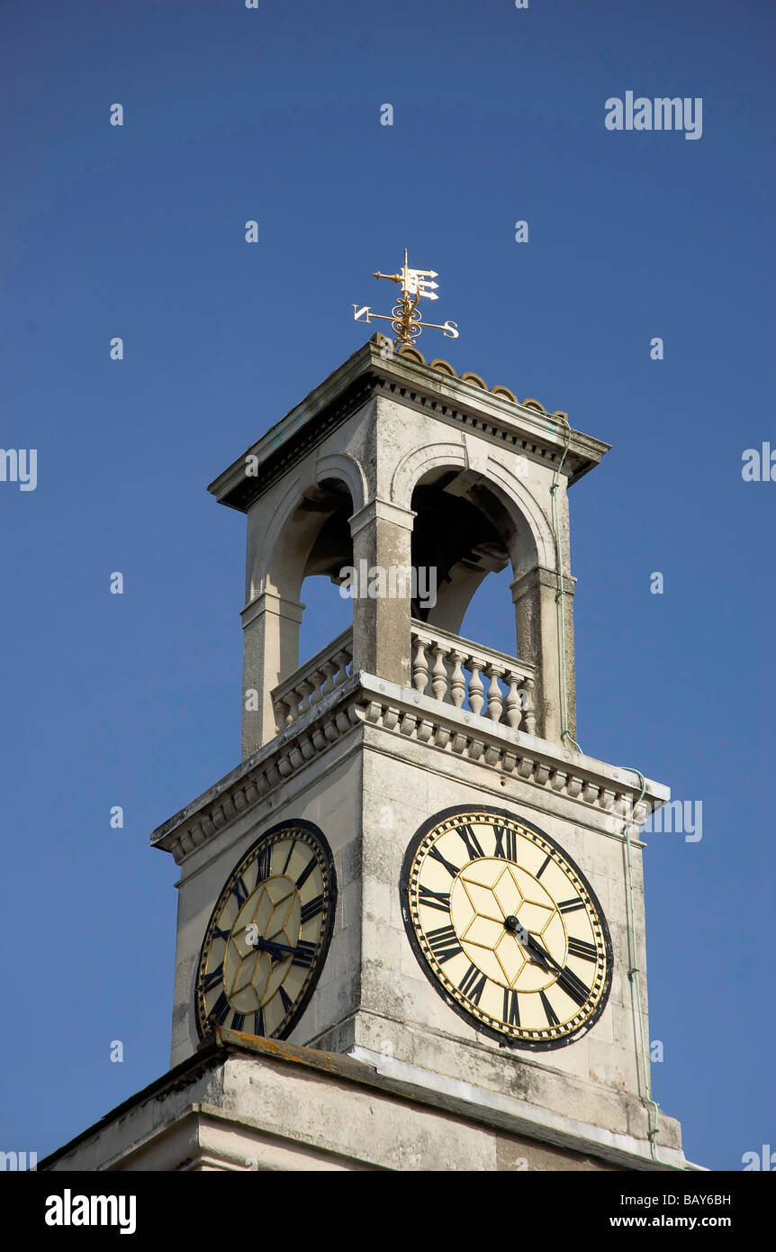 A clock tower with a weather vein on top Stock Photo - Alamy