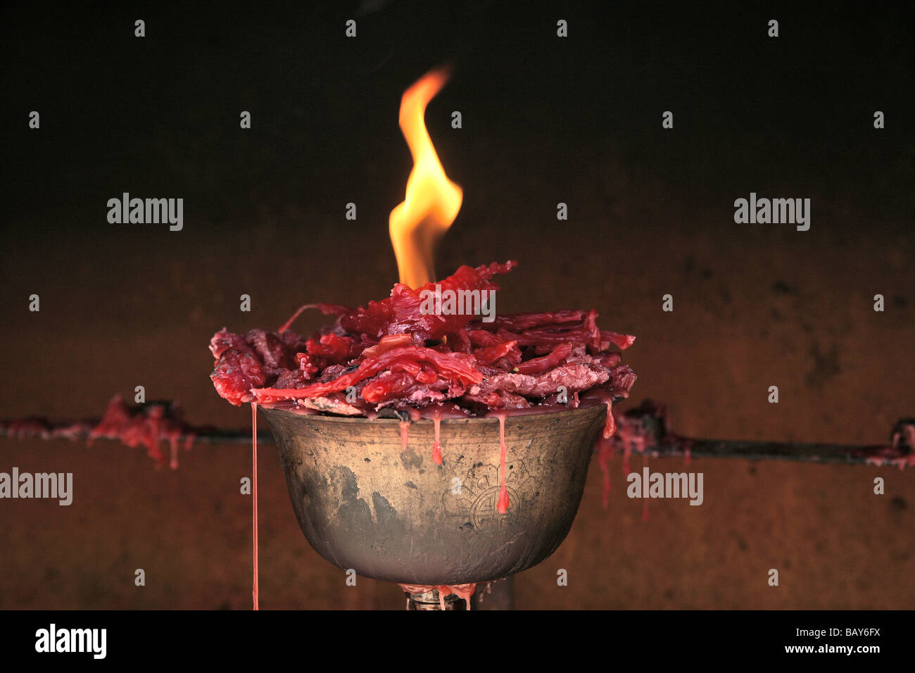 Traditional chinese red candles burning hi-res stock photography and ...