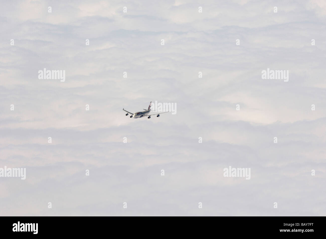 Aircraft above cloud layer Stock Photo - Alamy