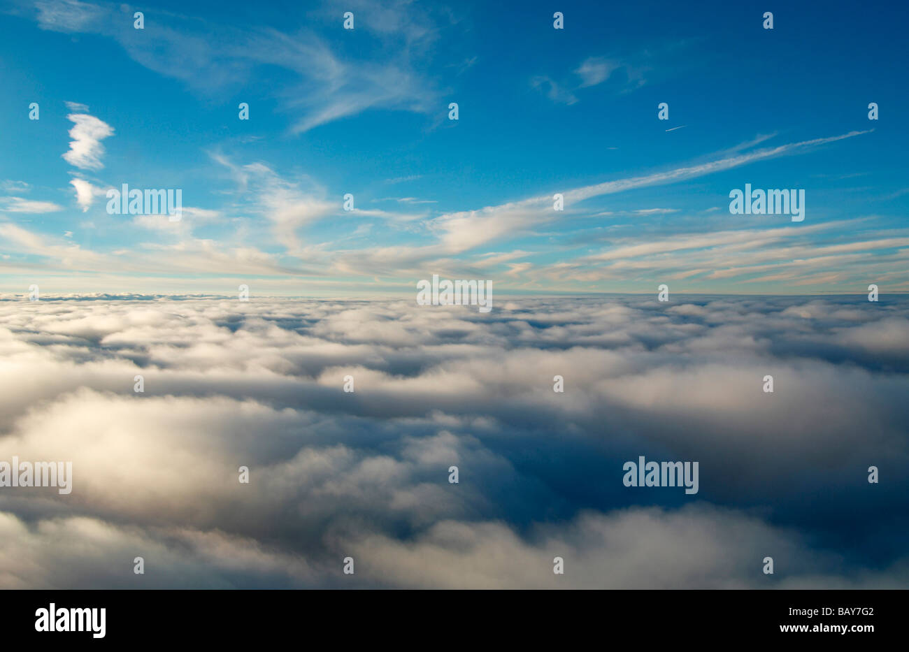 Cloud layer below blue sky Stock Photo - Alamy