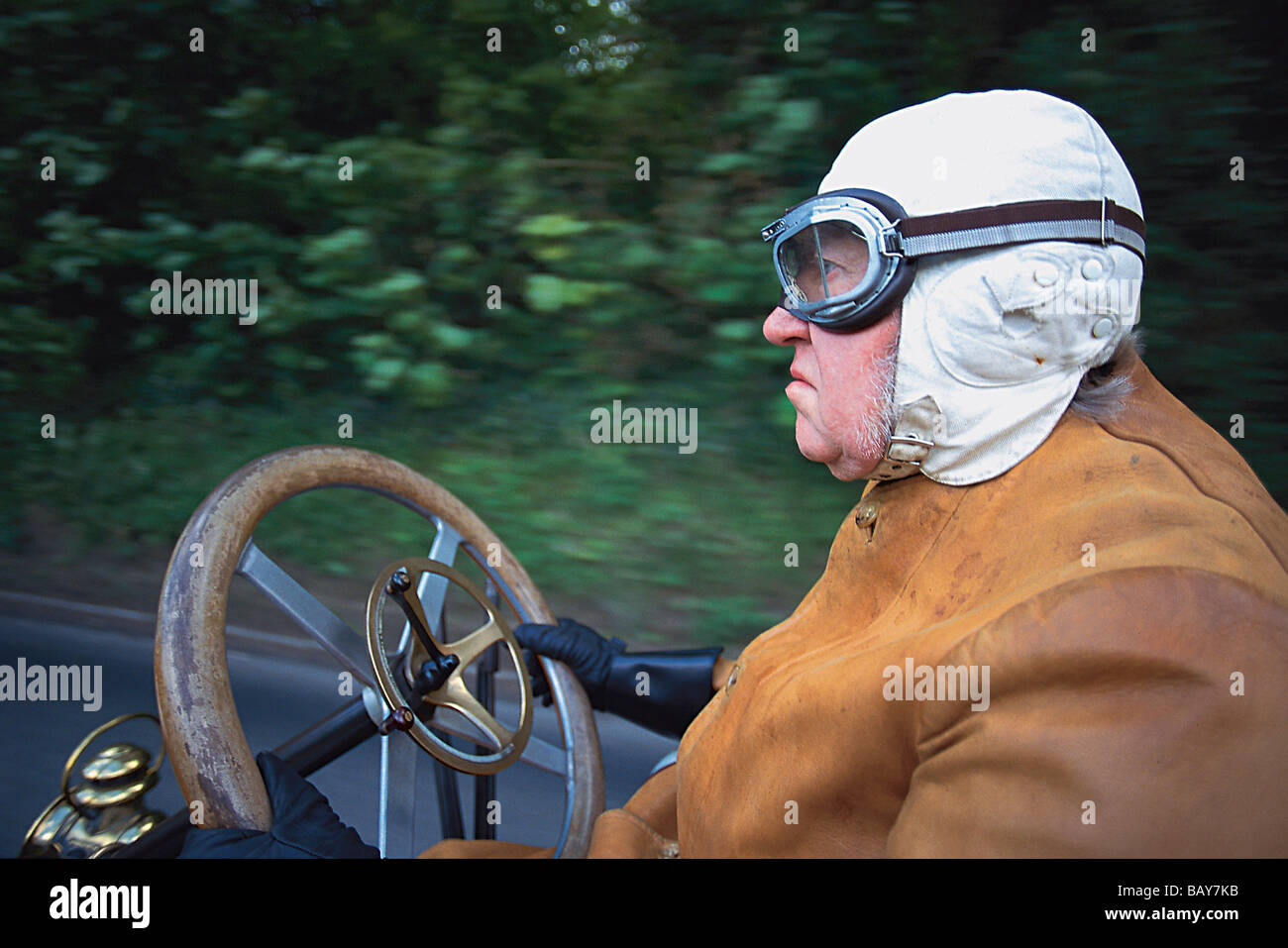 Old man riding a vintage car, Eastbourne, Sussex, Great Britain Stock ...