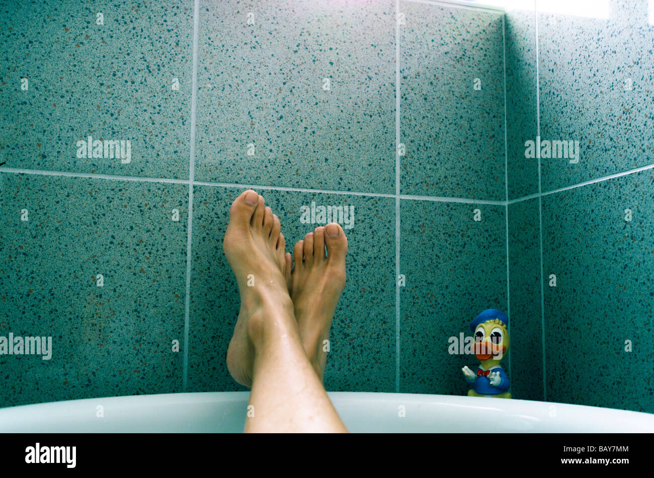 Feet on bathtub hi-res stock photography and images - Alamy