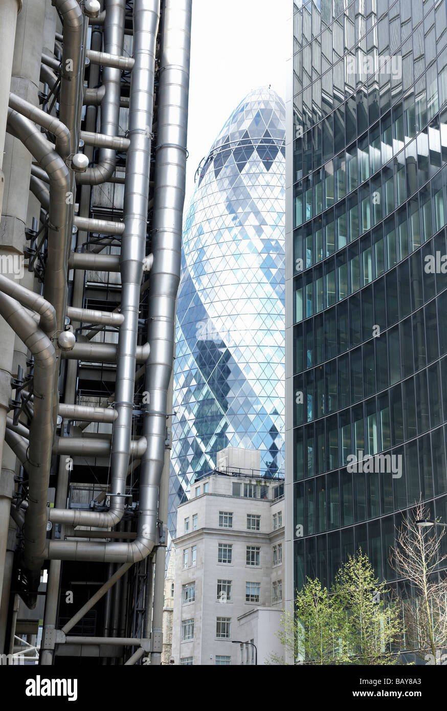 The Gherkin viewed between two buildings in London Stock Photo - Alamy