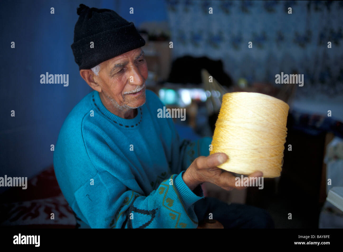 Silk spinner in Cairo's medieval Northern Cemetery Stock Photo - Alamy