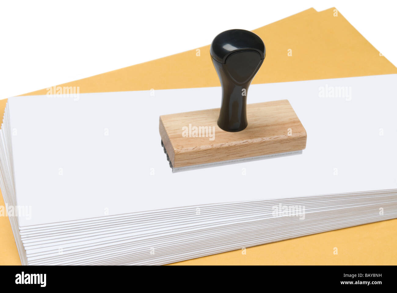 A rubber stamp on envelopes ready to send a message Stock Photo - Alamy